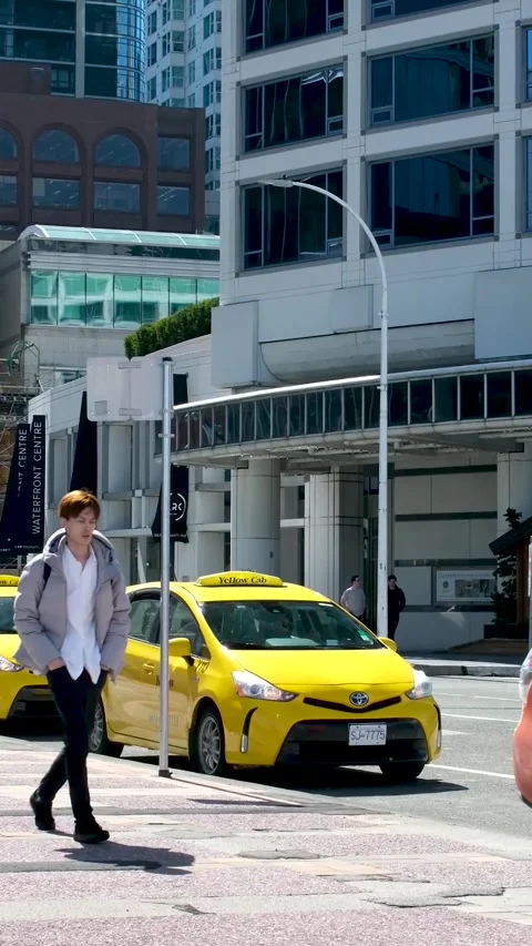 Taxi Cabs in Vancouver Real life in a bi... | Stock Video | Pond5