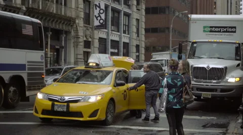 taxi driver getting into cab and closing... | Stock Video | Pond5