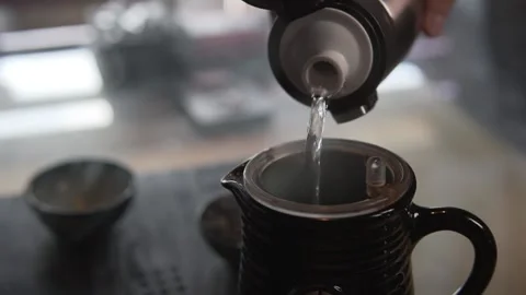 Tea pouring into cup slow motion close u... | Stock Video | Pond5