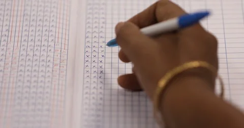 Teacher Checking Attendance Register In ... | Stock Video | Pond5