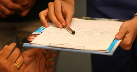 Teacher Checking Attendance Register In ... | Stock Video | Pond5