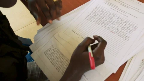 Teacher Grading Papers Stock Video Footage | Royalty Free Teacher ...