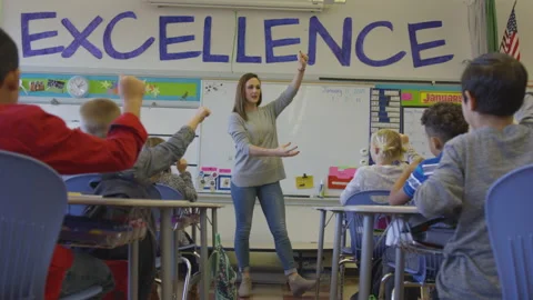 Teacher Makes Learning Fun In Classroom | Stock Video | Pond5