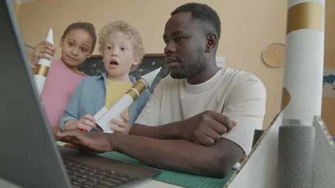 Teacher Showing Video on Laptop to Prima... | Stock Video | Pond5