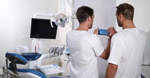 Team of Dentist Men Talking Teeth Radiog... | Stock Video | Pond5