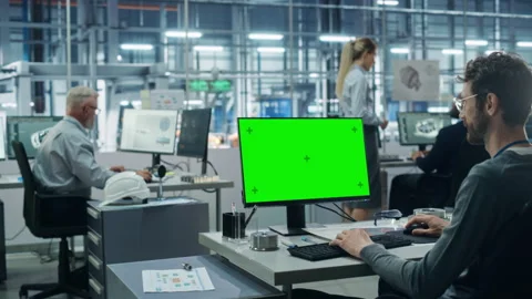 Team of Engineers Work on Green Screen C... | Stock Video | Pond5