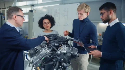 Team Of Engineers Working On Engine Desi... | Stock Video | Pond5