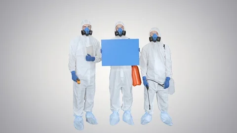 Team of epidemiologists holding blank bo... | Stock Video | Pond5