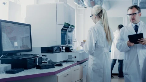 Team of Genetic Research Scientists Work... | Stock Video | Pond5