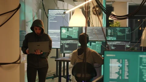 Team of hackers working on breaking comp... | Stock Video | Pond5