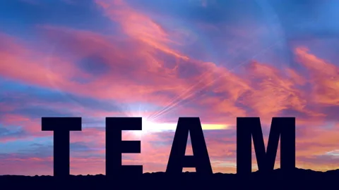 Team letters stand on ground at dawn, in... | Stock Video | Pond5
