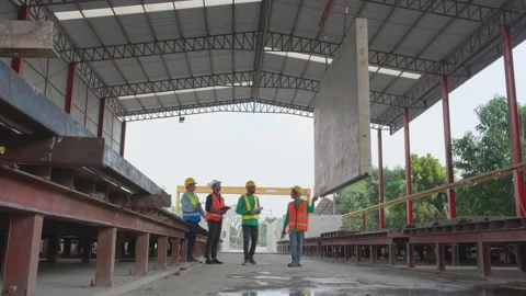 Team young asian engineer man walking wh... | Stock Video | Pond5