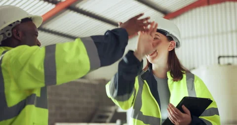 Teamwork, high five and construction wor... | Stock Video | Pond5