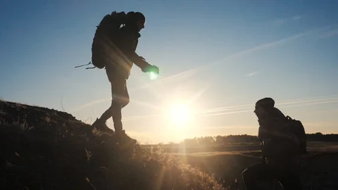 teamwork two men help helping hand busin... | Stock Video | Pond5