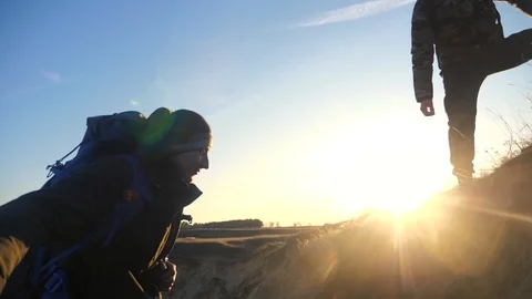 teamwork two men help helping hand busin... | Stock Video | Pond5