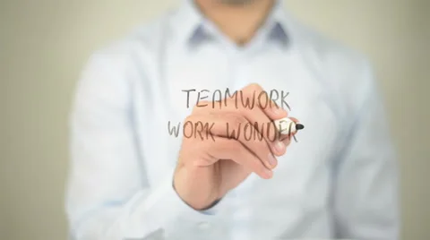 Teamwork Work Wonder , man writing on tr... | Stock Video | Pond5