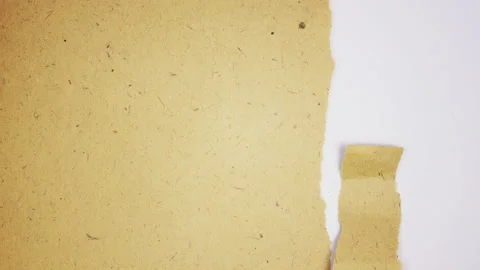 Tears off part of paper stop motion anim... | Stock Video | Pond5