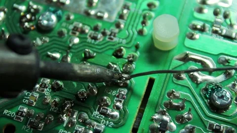 Technical soldering of chips using a sol... | Stock Video | Pond5