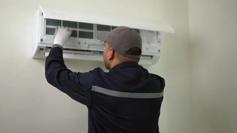 Technician in uniform check and cleaning... | Stock Video | Pond5