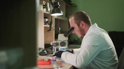 Technician Working on Electronic Compone... | Stock Video | Pond5