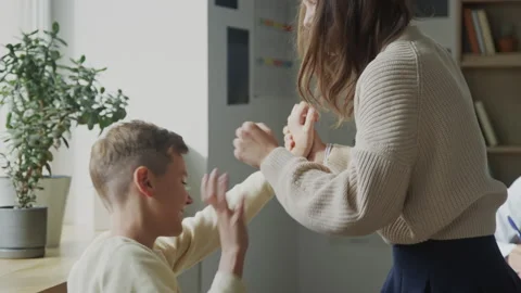 Teen Boy And Girl Fighting In Classroom | Stock Video | Pond5