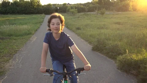 Teen Boy Bike Stock Footage ~ Royalty Free Stock Videos | Pond5