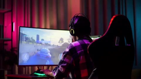 Teen Boy Gamer Wearing Head Phones And P... | Stock Video | Pond5