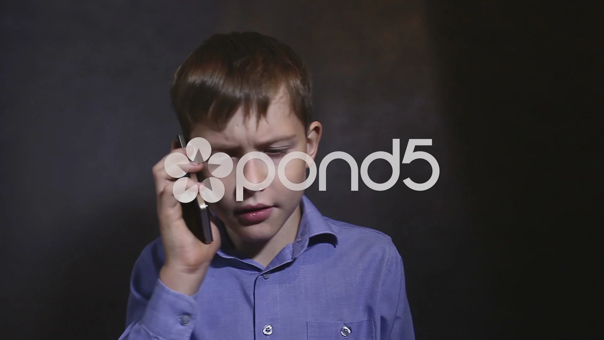 Teen Boy Talking On Phone