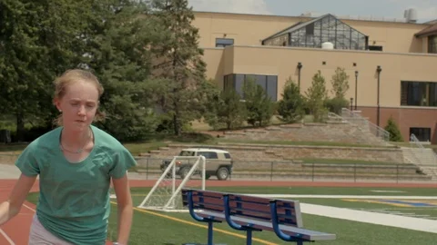teen girl athlete running track sprints ... | Stock Video | Pond5