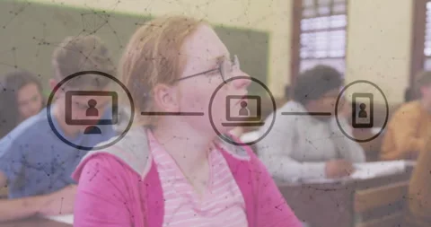 Teen girl focusing on classwork in class... | Stock Video | Pond5