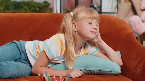 Teen girl at home suffers from unfair si... | Stock Video | Pond5