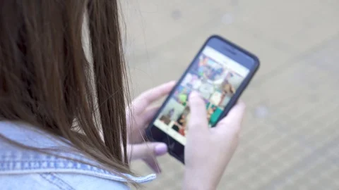 Scroller Girl Stock Video Footage | Royalty Free Scroller Girl Videos | Pond5