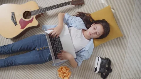 Teen Girl With Snacks Typing On A Laptop... | Stock Video | Pond5