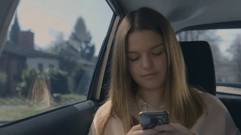 Teen Girl Texting While Driving in the P... | Stock Video | Pond5