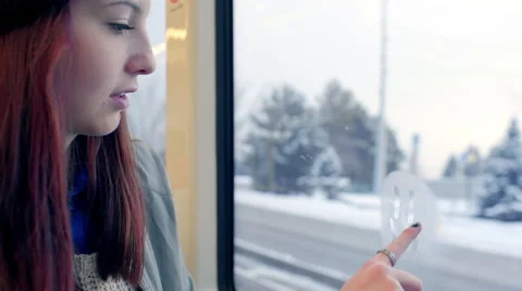 Teen Rides Train, She Draws A Smiley Fac... | Stock Video | Pond5