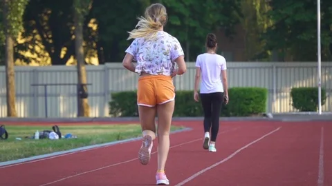 Teen sporty girl running sprint on the s... | Stock Video | Pond5