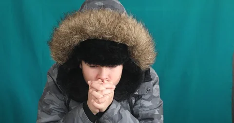 Teenage boy chilling at green screen bac... | Stock Video | Pond5