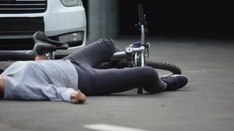 Teenage boy dead body on road after traf... | Stock Video | Pond5