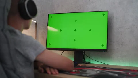 Teenage boy looks at PC monitor with chr... | Stock Video | Pond5