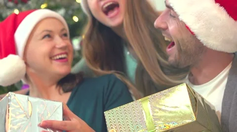 Teenage daughter presenting a surprise g... | Stock Video | Pond5