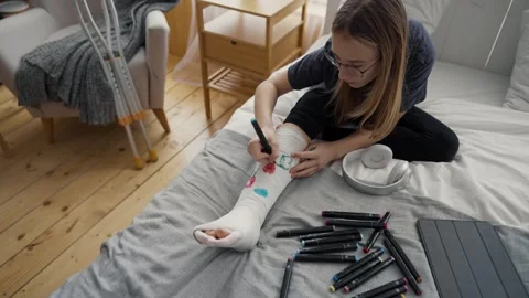 Teenage girl after injury with broken le... | Stock Video | Pond5