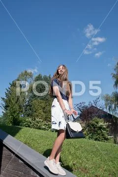 Teenage girl with imperfect skin grimaces at the camera, generation z ...