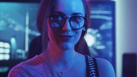 Teenage Girl Pro Gamer Smiles at Camera... | Stock Video | Pond5