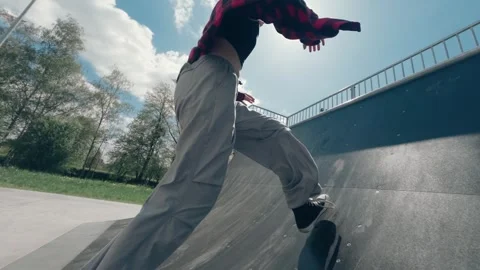 teenage girl running on a ramp in a skat... | Stock Video | Pond5