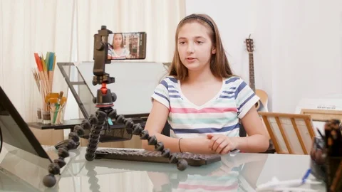 Teenage girl streaming a live video for ... | Stock Video | Pond5