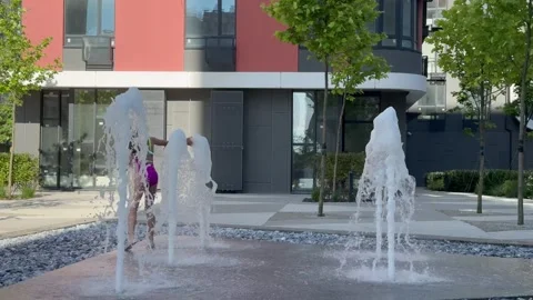 Teenage girls having fun in the towns wa... | Stock Video | Pond5