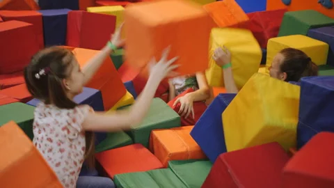 Teenage girls throw each other soft big ... | Stock Video | Pond5