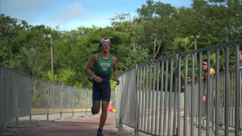 Teenage latin athlete running the final ... | Stock Video | Pond5