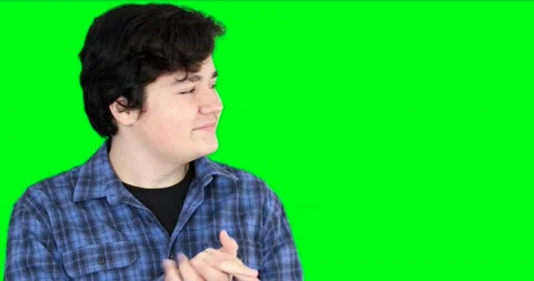 Teenager clapping hands at green screen ... | Stock Video | Pond5