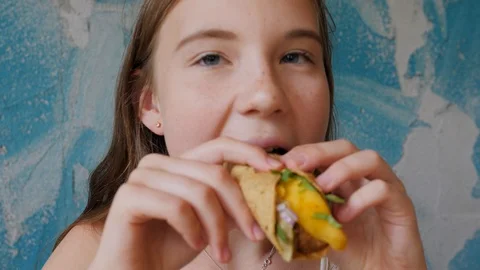 Eating Tacos Stock Footage ~ Royalty Free Stock Videos | Pond5